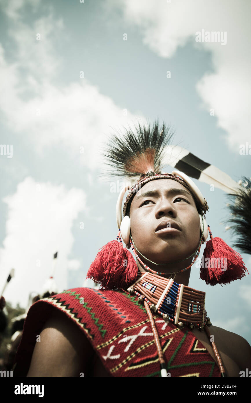 Naga tribesman in traditional outfit during the annual Hornbill ...