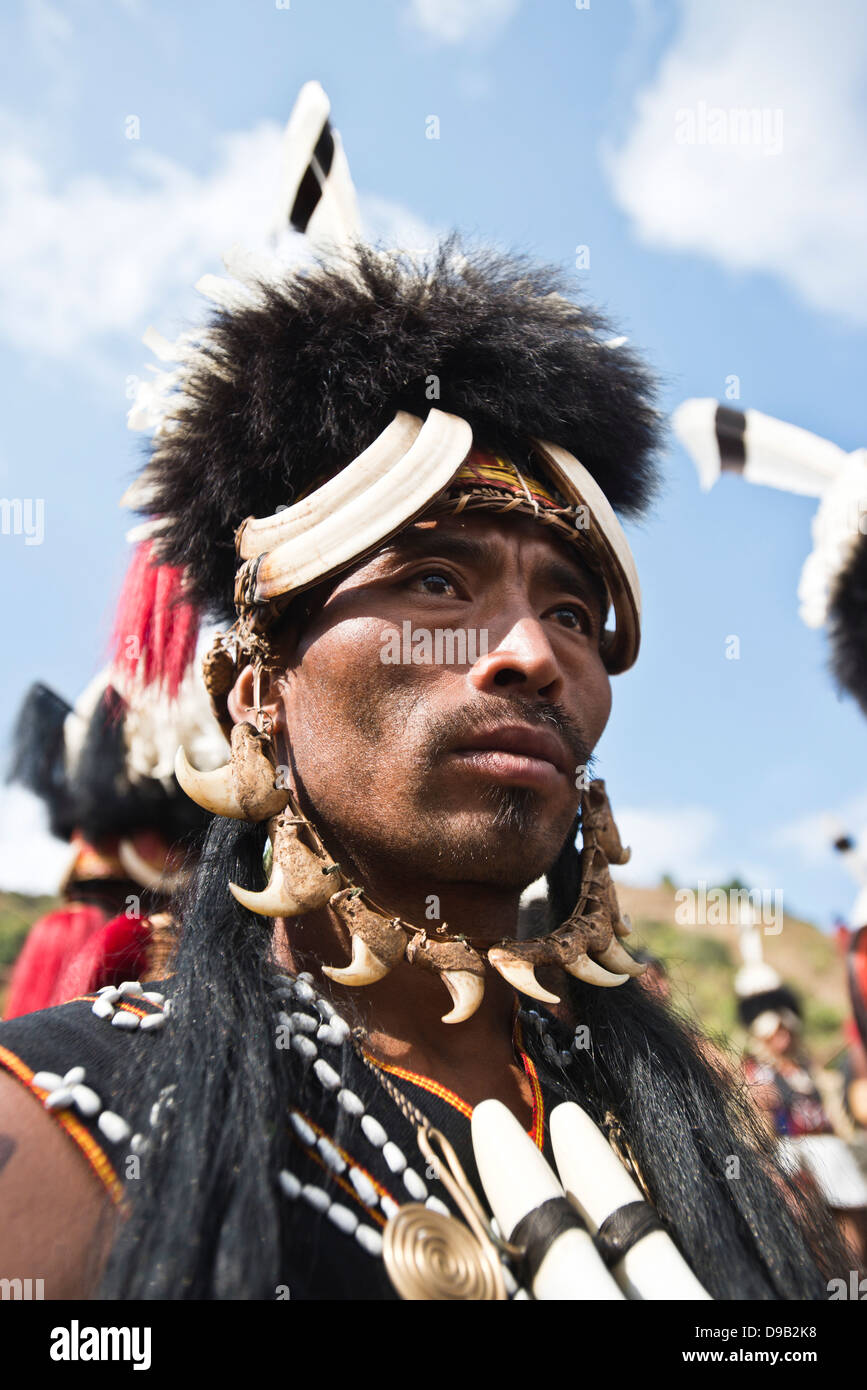 Naga tribesman in traditional outfit during the annual Hornbill ...