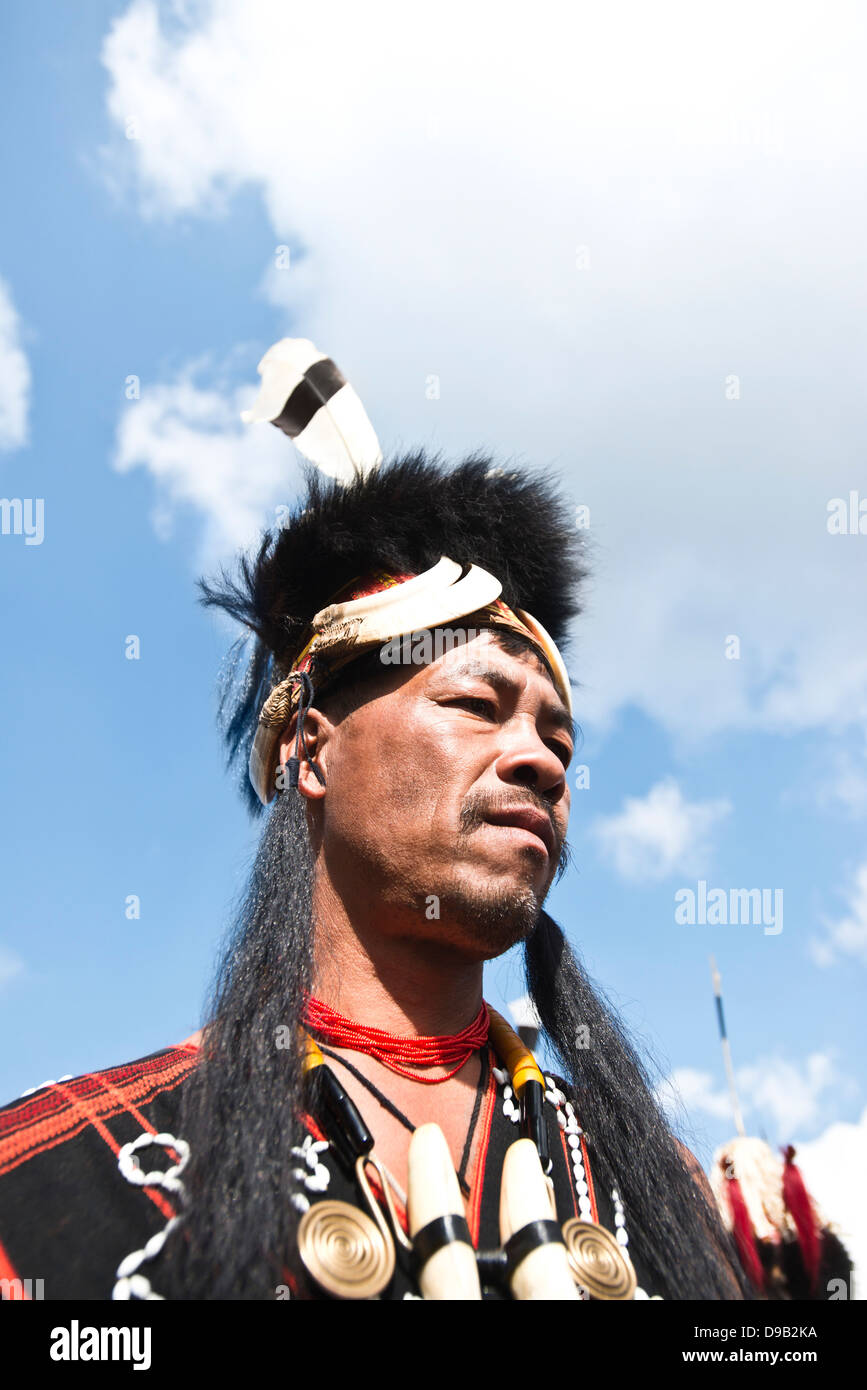 Naga tribesman in traditional outfit during the annual Hornbill ...