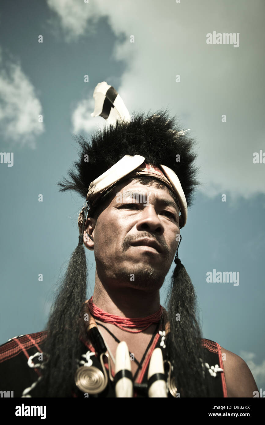 Naga tribesman in traditional outfit during the annual Hornbill ...