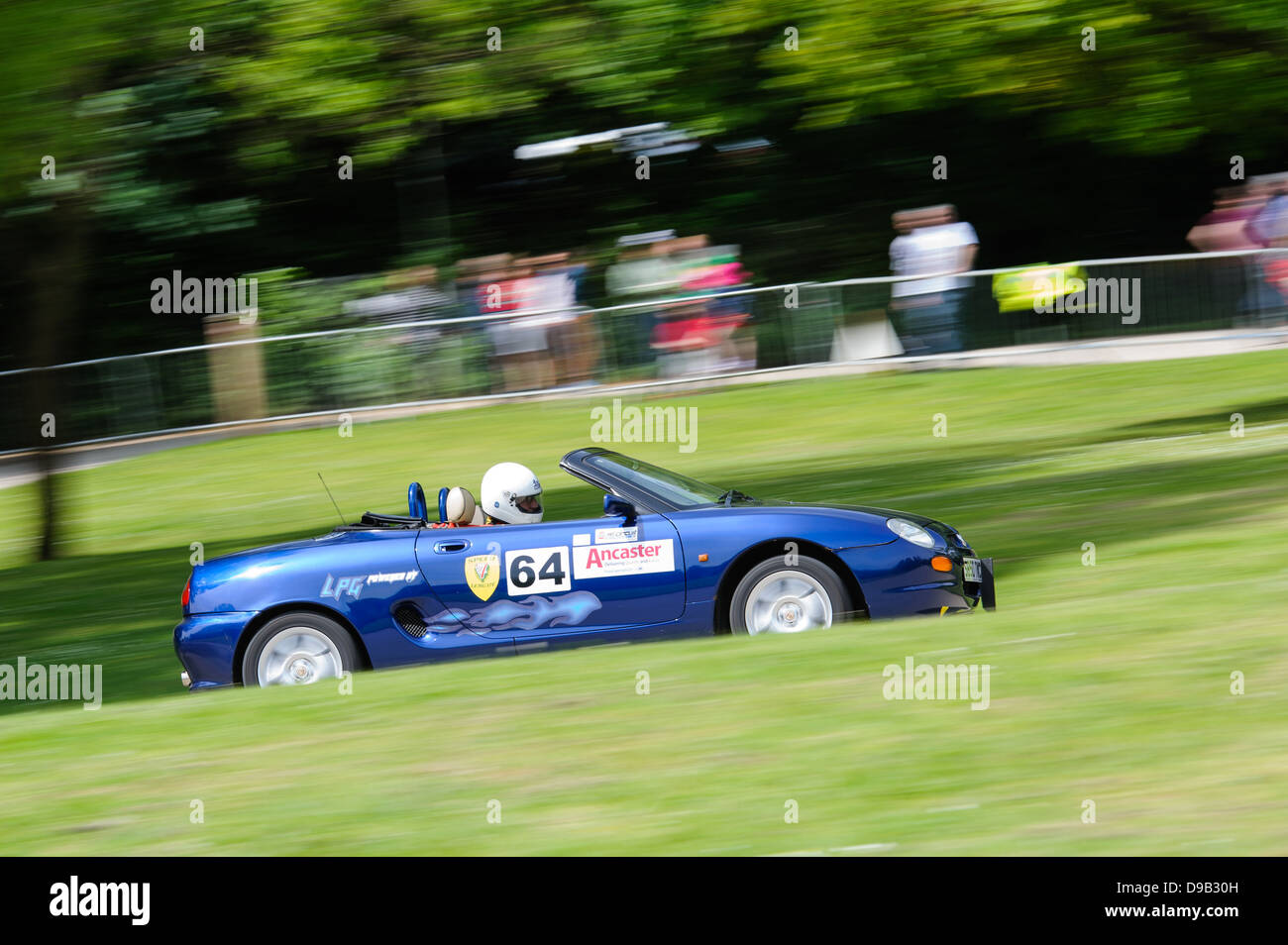 A car racing around Crystal Palace Park in London for the Motorsport at ...