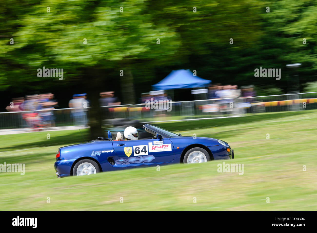 A car racing around Crystal Palace Park in London for the Motorsport at ...