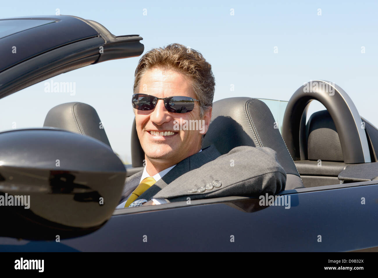 Man convertible car hi-res stock photography and images - Alamy