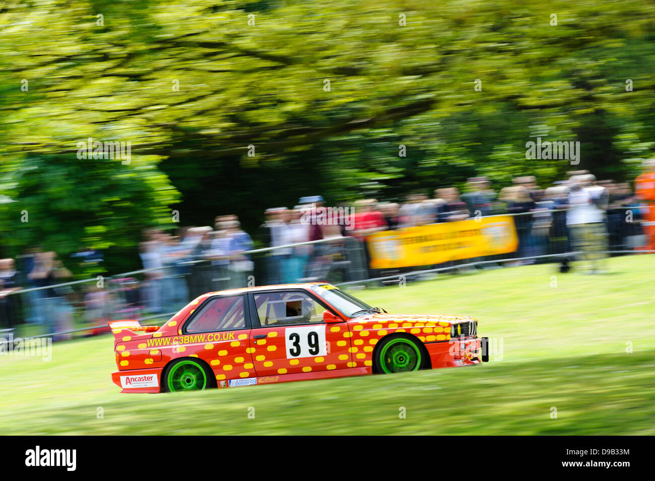 A car racing around Crystal Palace Park in London for the Motorsport at ...