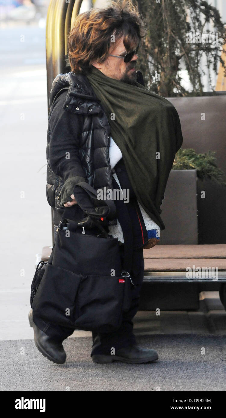 Peter Dinklage carrying his baby daughter as he arrives at his ...