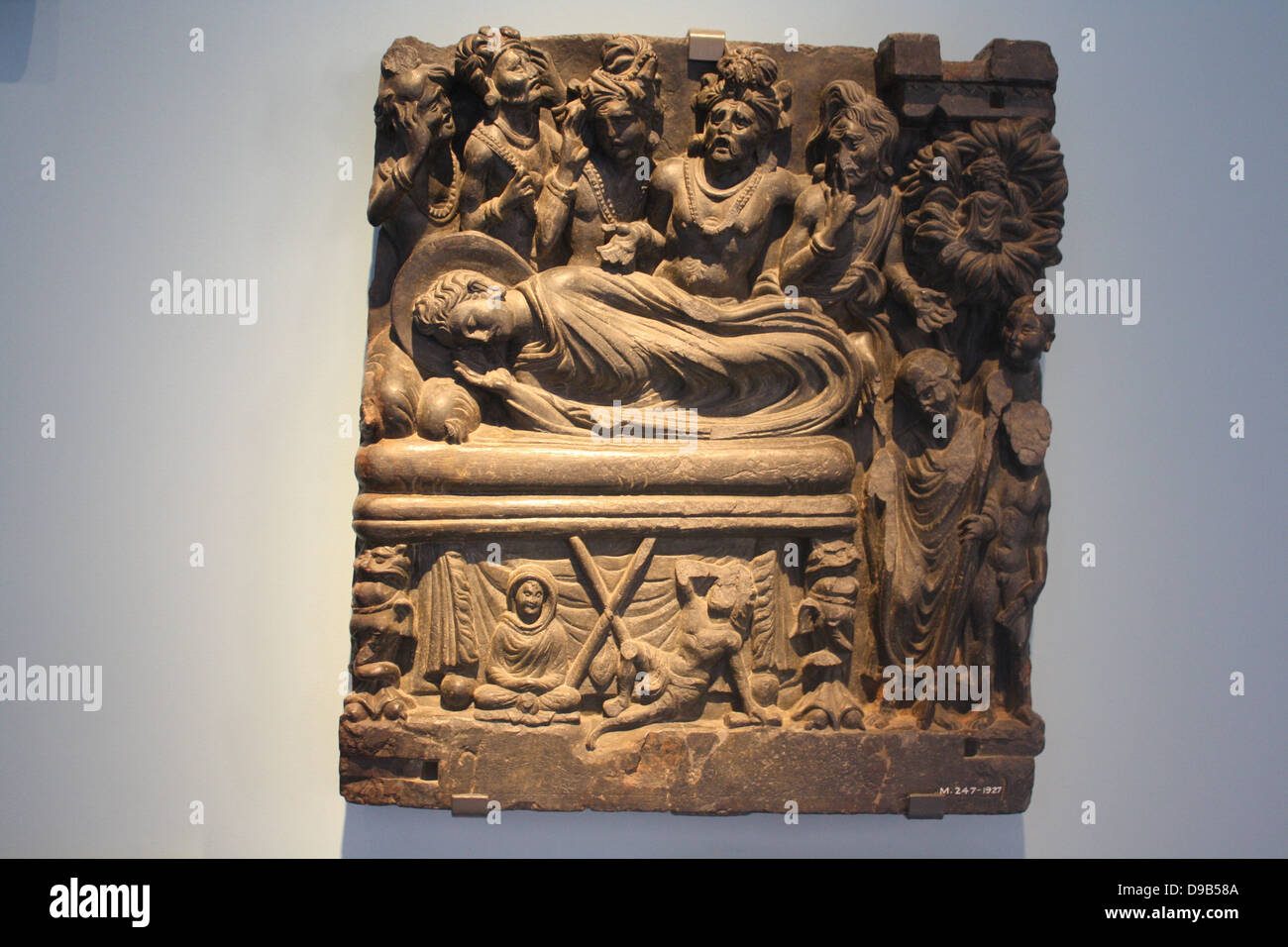 The Death of the Buddha. AD100-300 Ancient Gandhara. The Buddha lies on ...