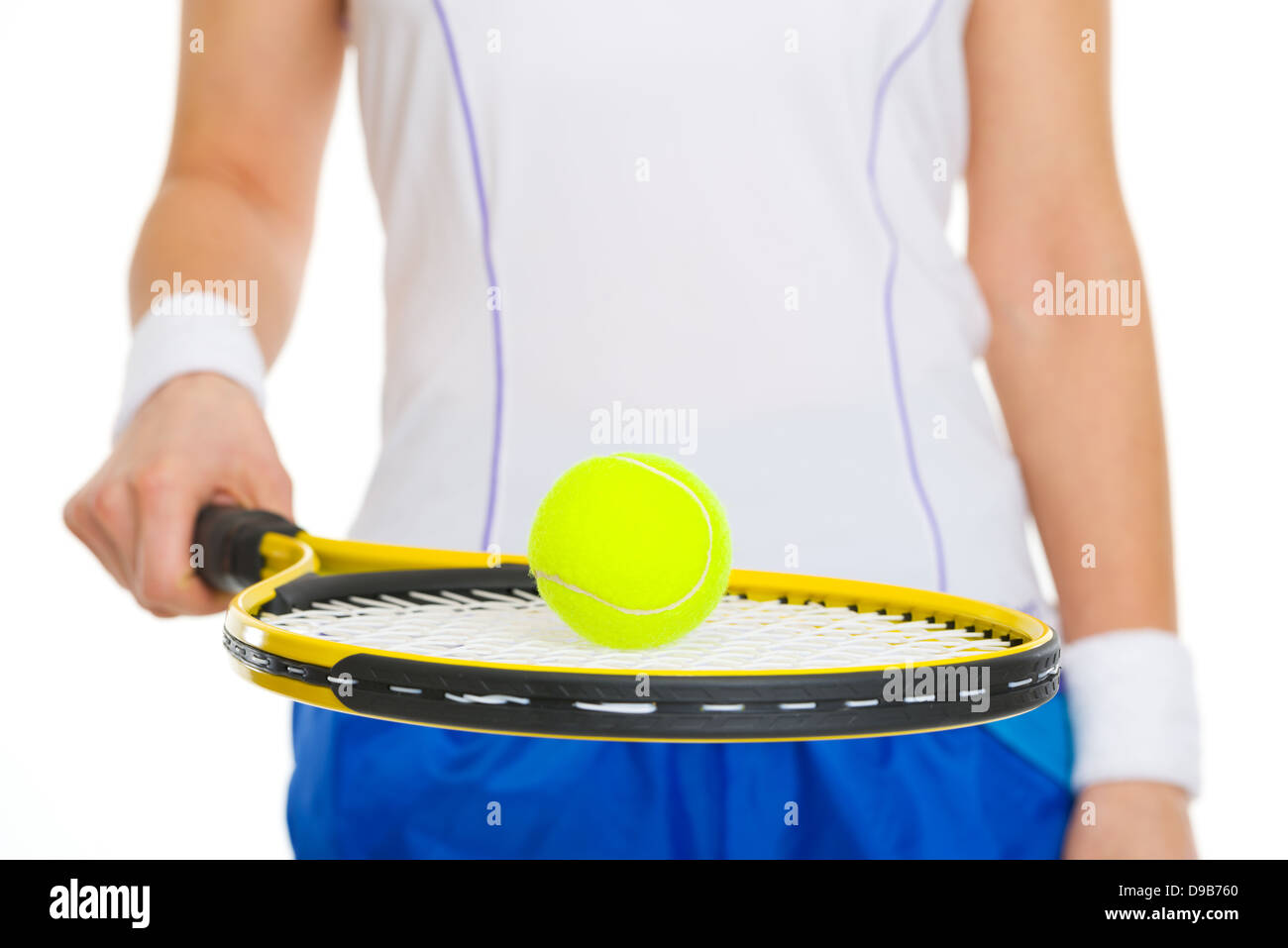 Closeup on tennis ball on racket in hand of tennis player Stock Photo ...