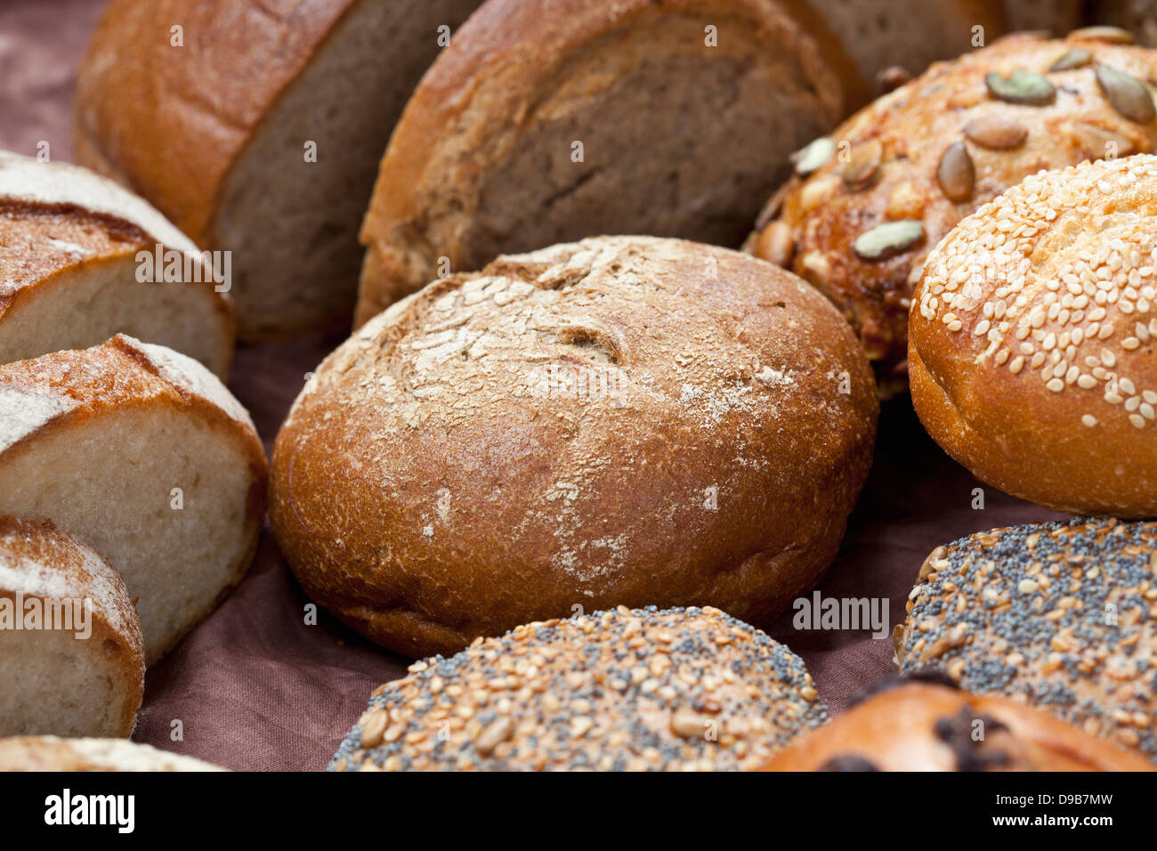 Mixed sorts of bread and rolls, close up Stock Photo - Alamy