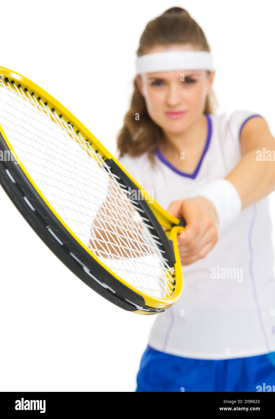 Closeup on racket in hand of tennis player Stock Photo - Alamy