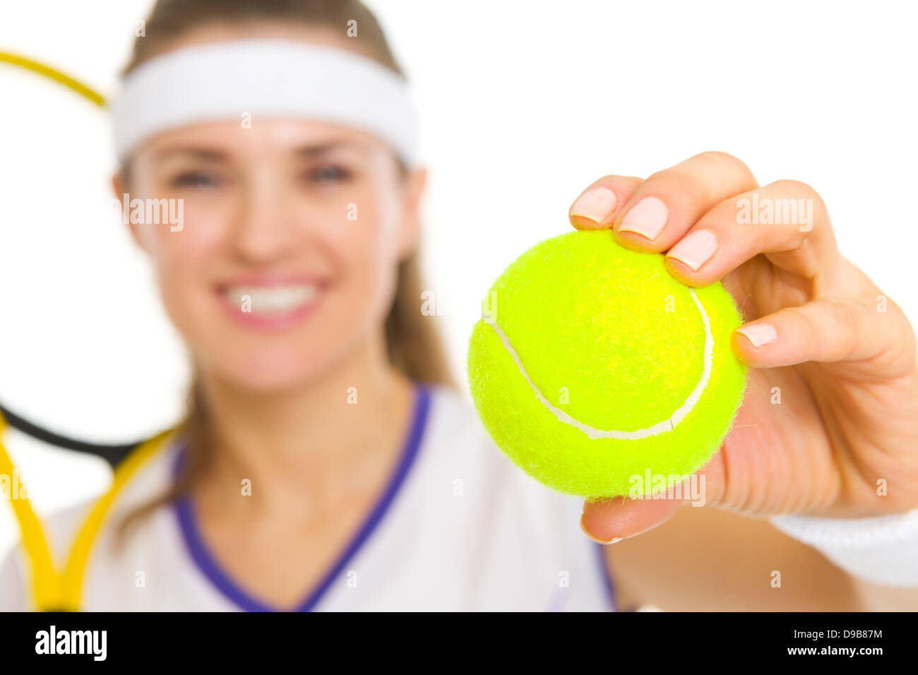 Closeup on tennis ball in hand of female tennis player Stock Photo - Alamy