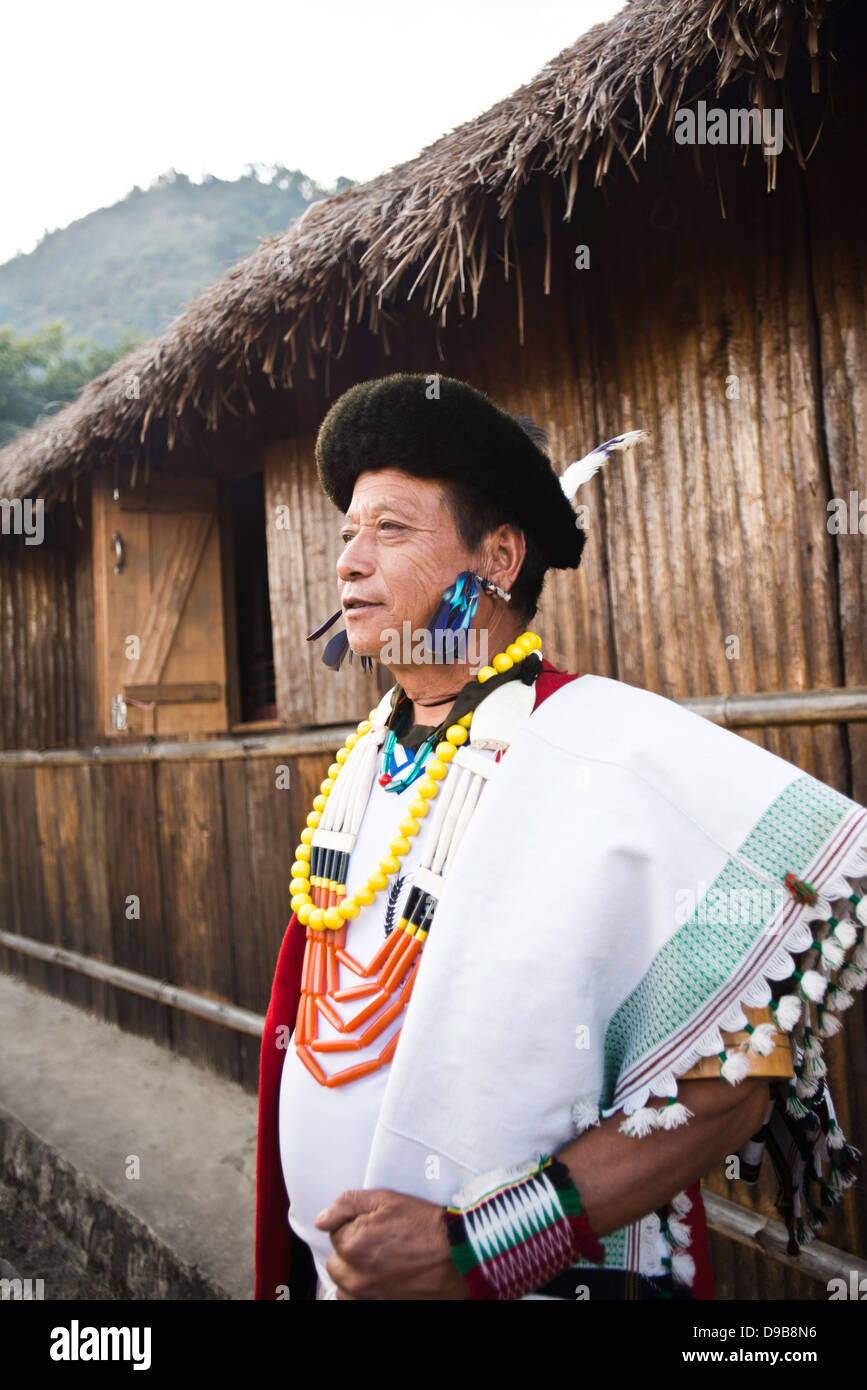 Naga tribesman in traditional outfit during the annual Hornbill ...