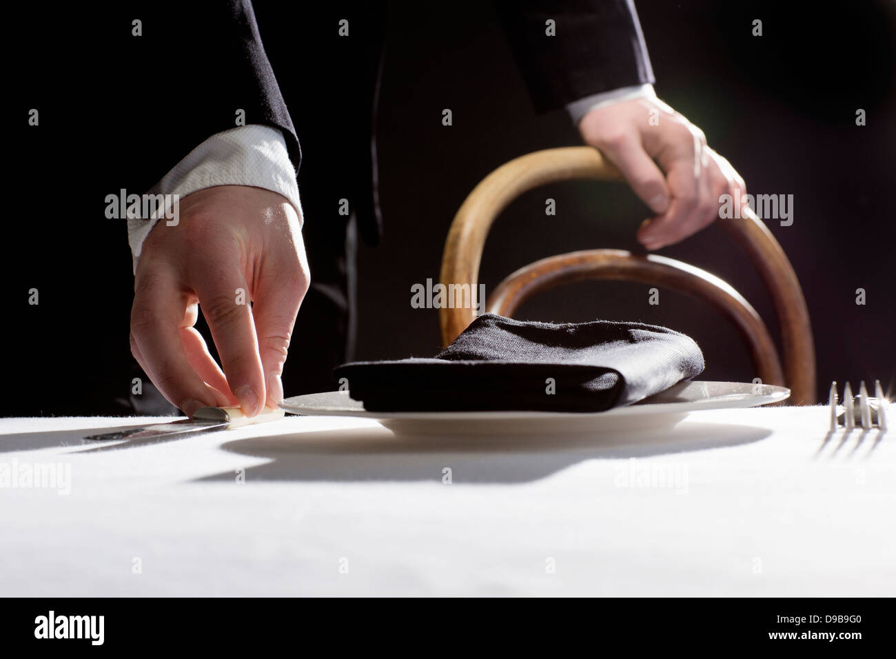 waiter preparing table setting Stock Photo - Alamy