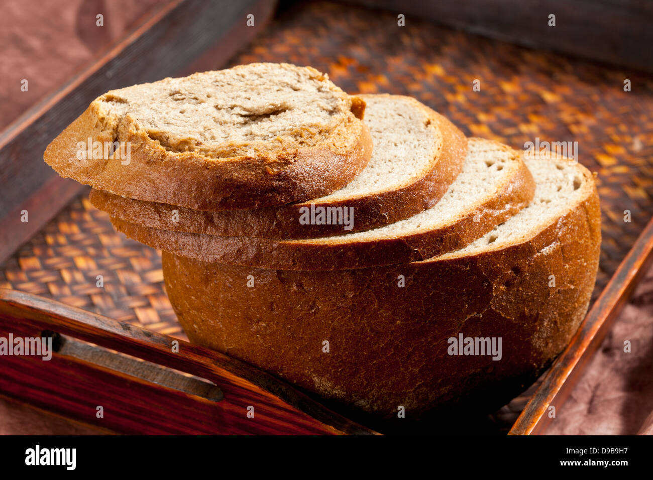 Rustic rye mix bread in tray, close up Stock Photo - Alamy