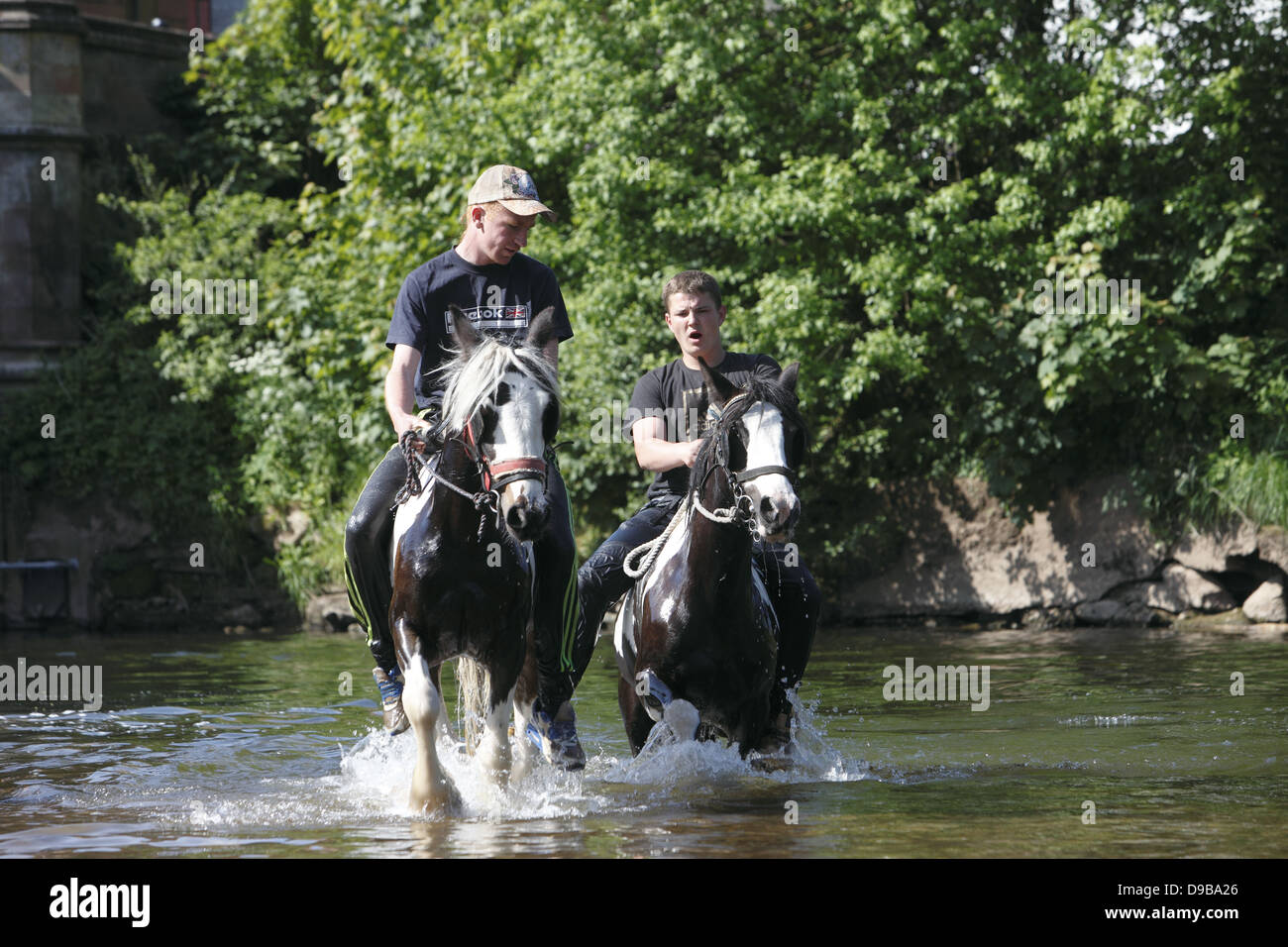 Gypsies wash their horses and ponies in the River Eden before parading ...