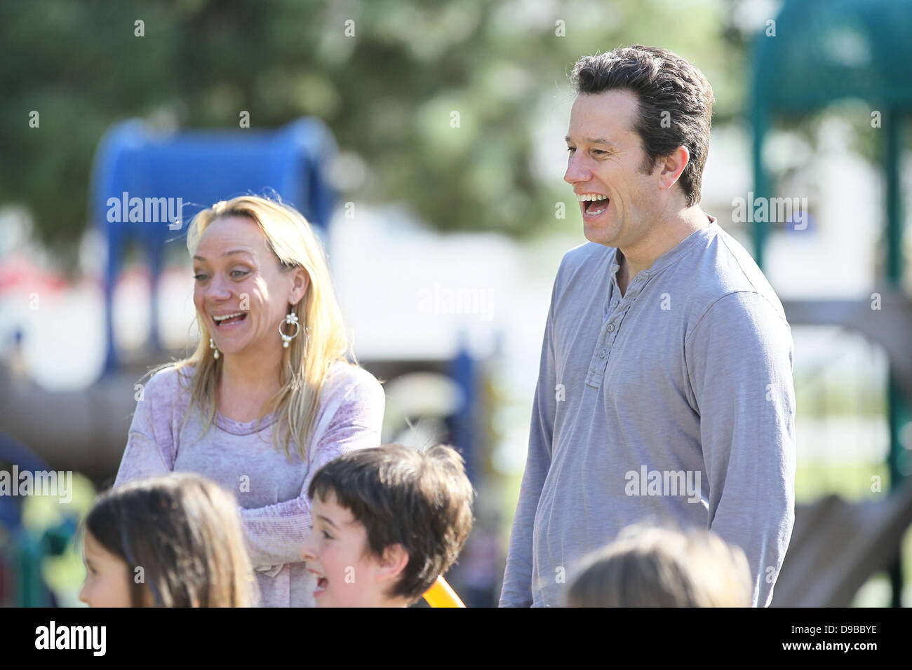 Nicole Sullivan and her husband Jason Packham enjoy the day at a park ...