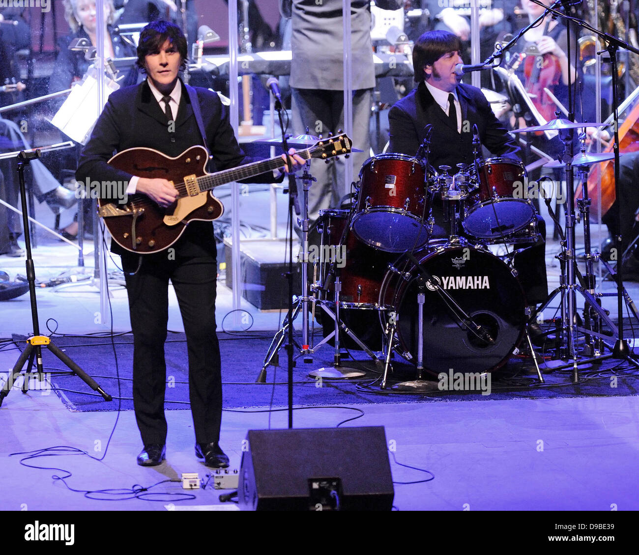 John Brosnan, as George Harrison, and Chris Camilleri, as Ringo Starr ...
