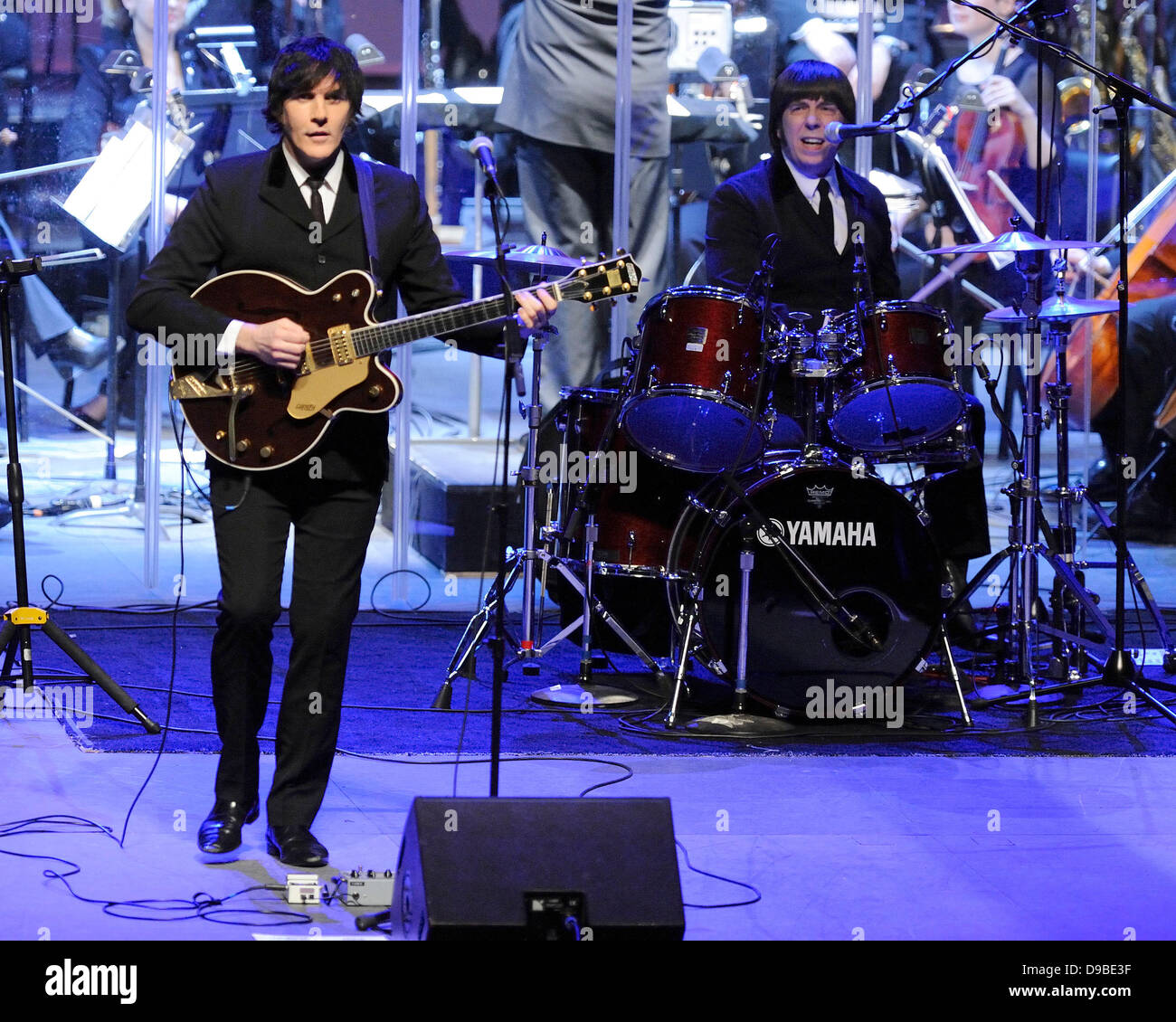 John Brosnan, as George Harrison, and Chris Camilleri, as Ringo Starr ...