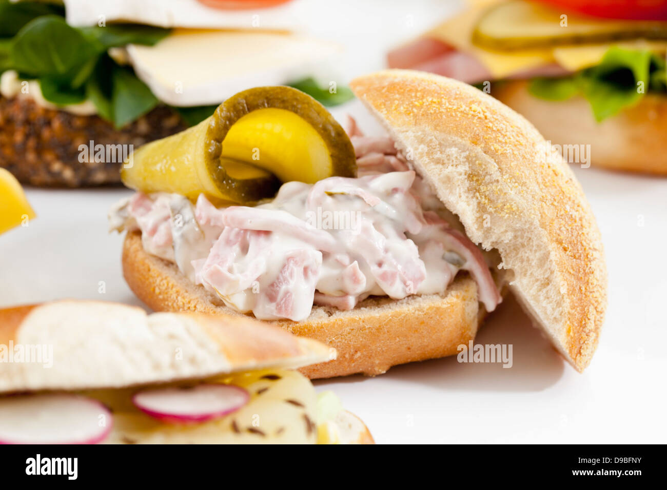 Varieties of bread rolls on white background, close up Stock Photo - Alamy