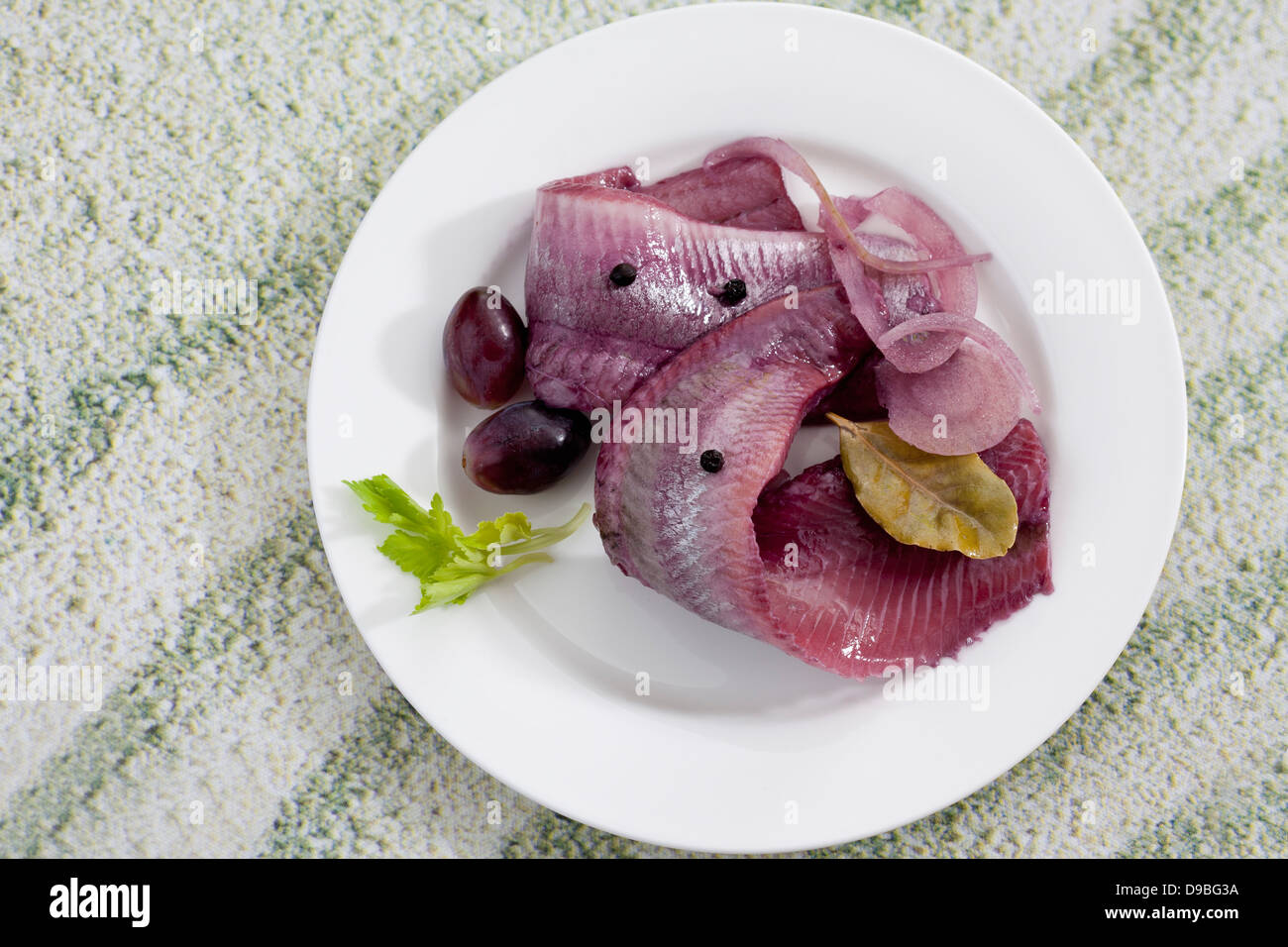 Herring in sherry vinegar with onions on plate, close up Stock Photo ...