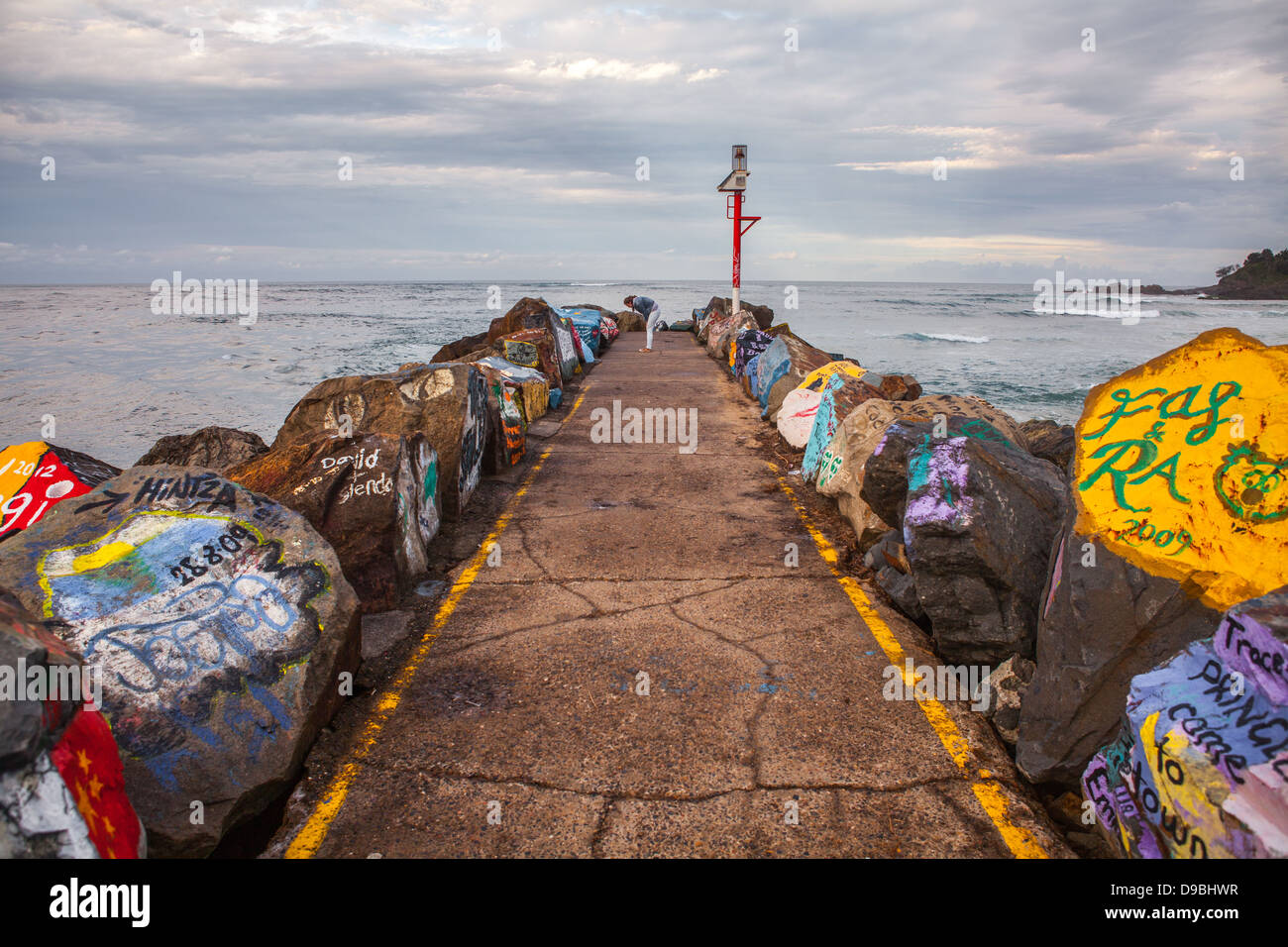 A woman stands at the end of a jetty near Brisbane, Australia Stock ...
