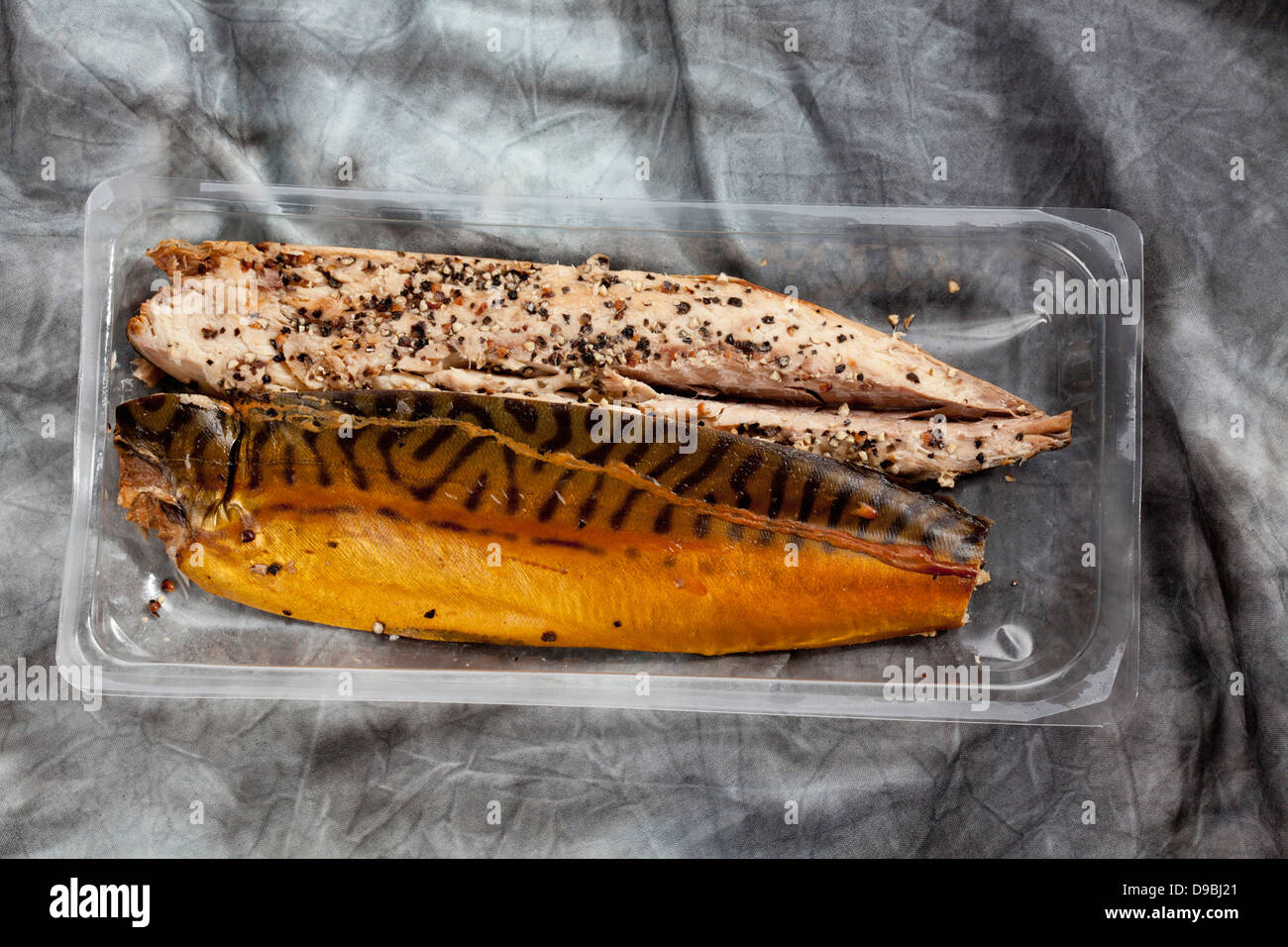 Mackerel with peppercorns in plastic box Stock Photo - Alamy