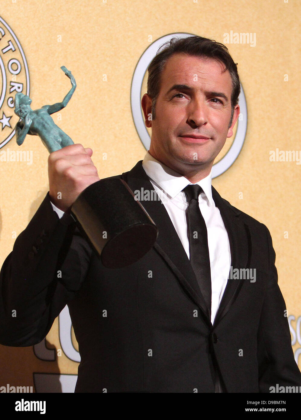 Jean DuJardin with his award for Outstanding Performance By A Male ...