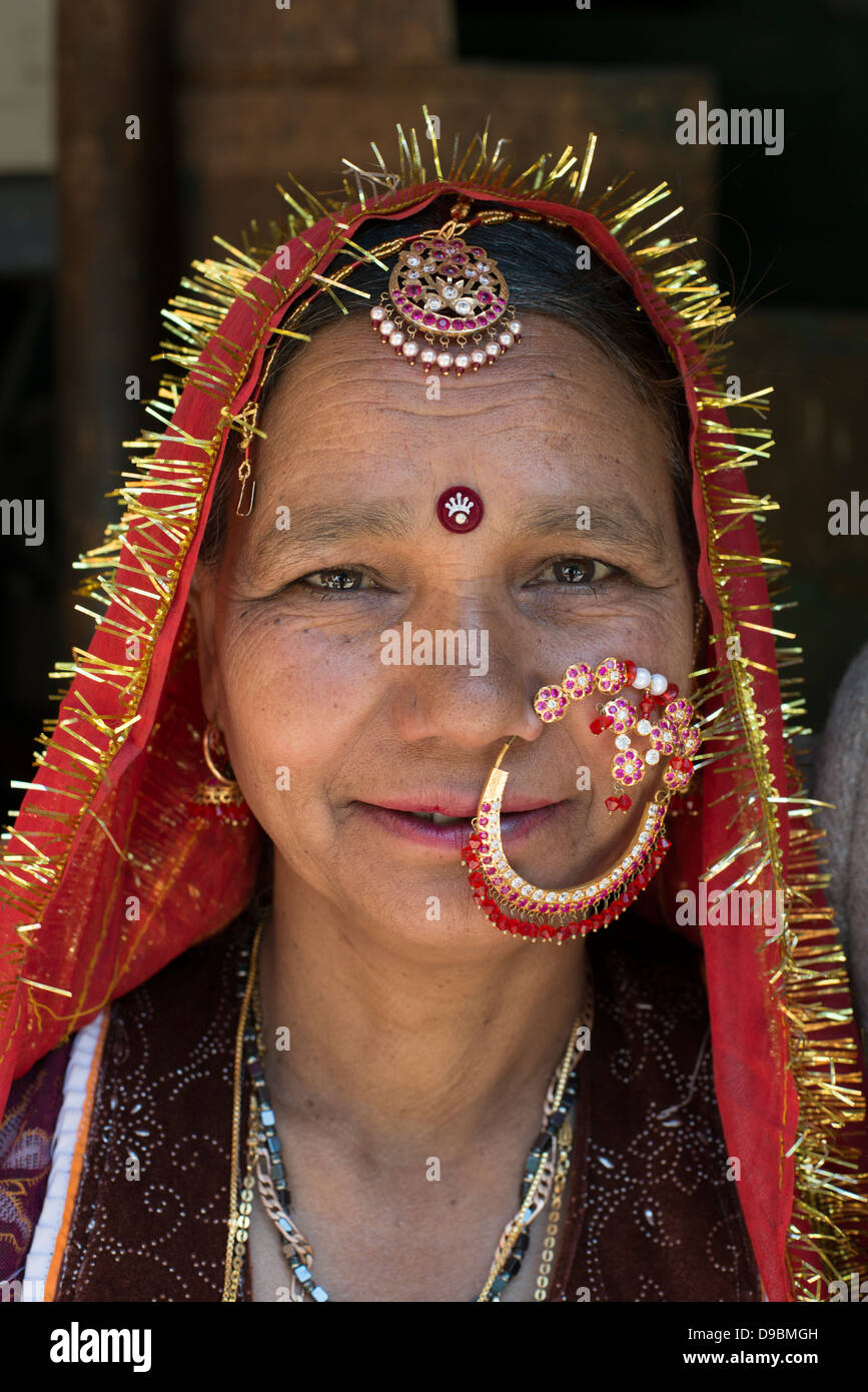 A Gaddi tribal matriarch poses for the camera at the Himalayan village ...