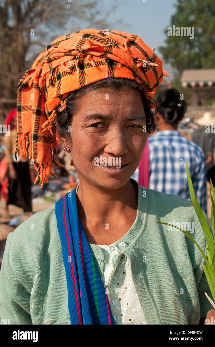 Portrait of an Old Pa-O woman wearing traditional orange checked ...