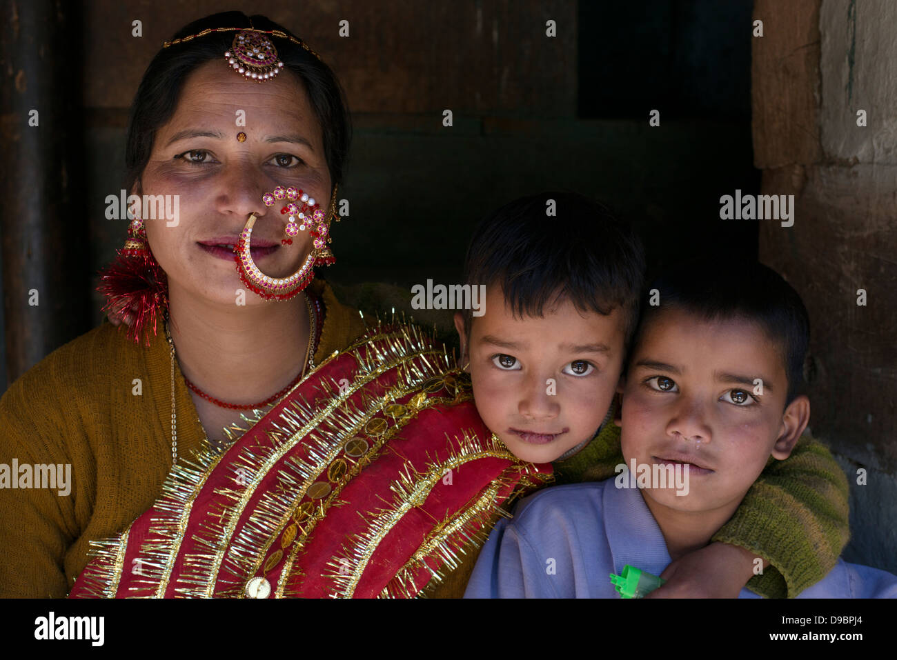 A Gaddi tribeswoman poses for the camera with her sons at the Himalayan ...