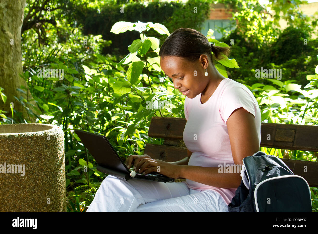 female African college student using laptop outdoors Stock Photo - Alamy