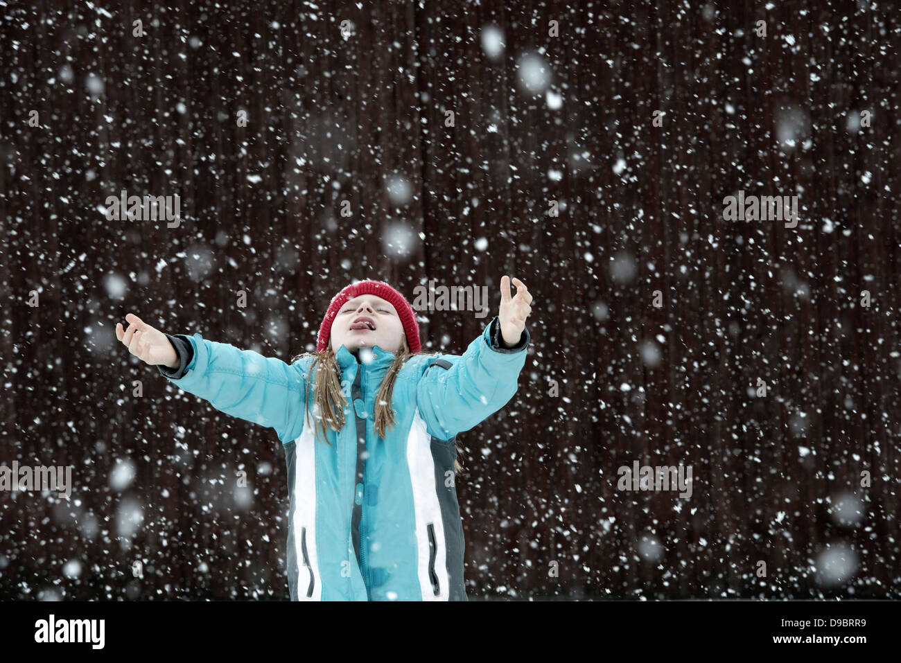 Girl catching snowflakes tongue hi-res stock photography and images - Alamy