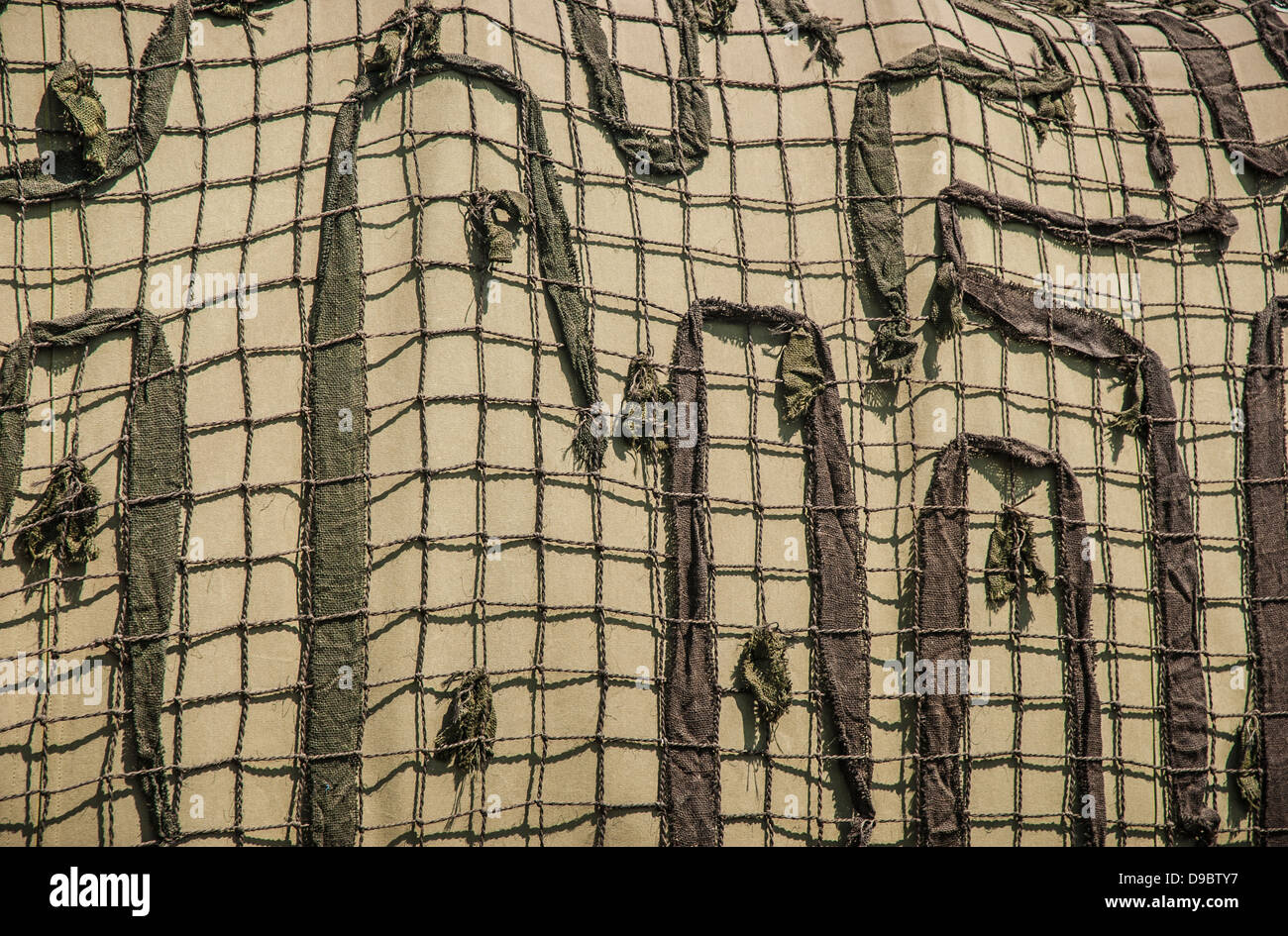 Close detail of military Camouflage netting Stock Photo - Alamy