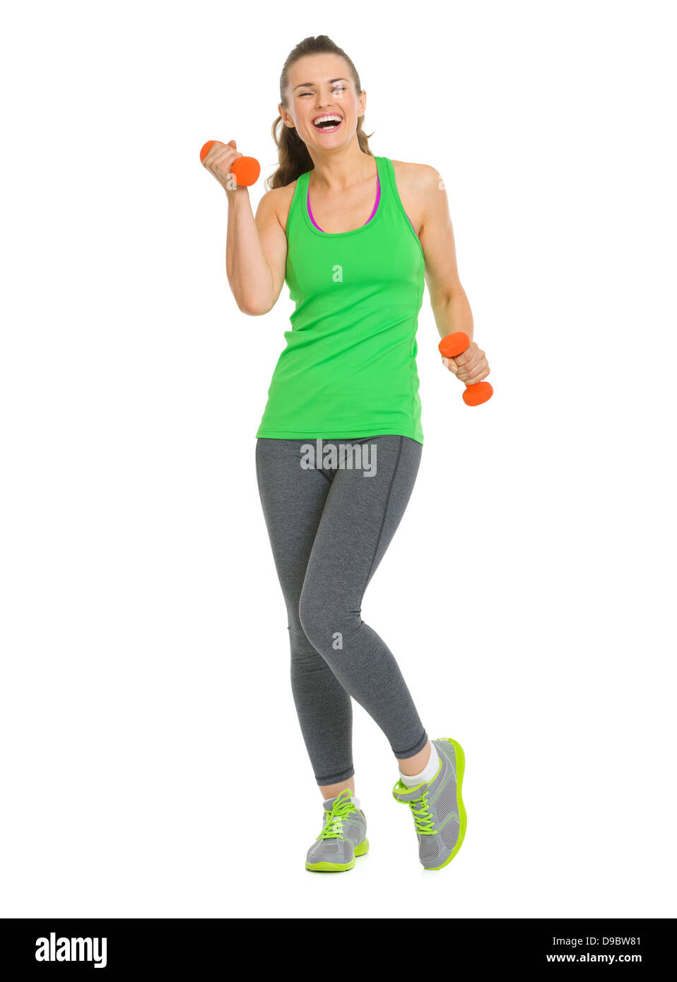 Happy fitness young woman workout with dumbbells Stock Photo - Alamy