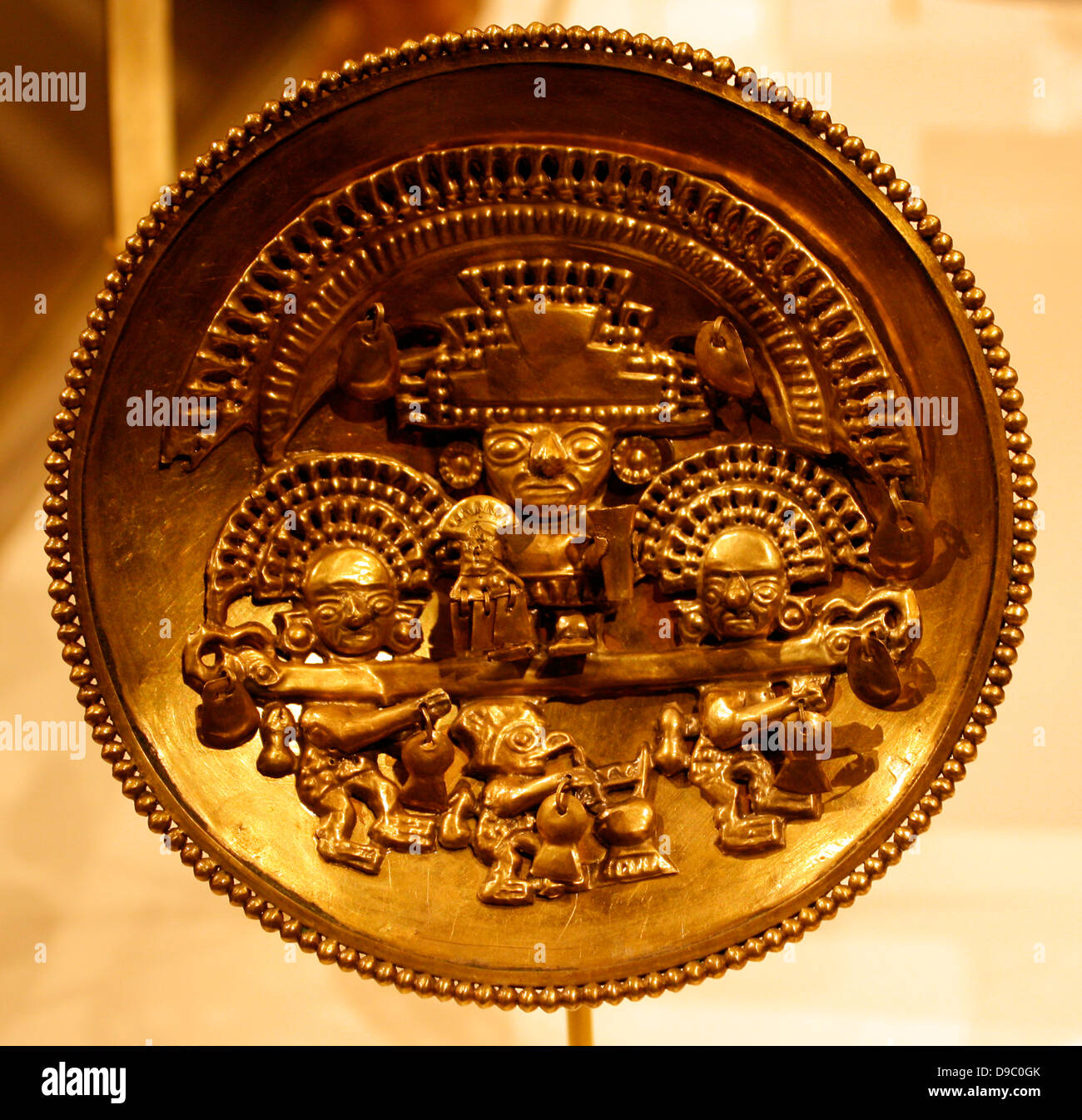 Pair of Earflares. Peru, Chimu. 12th-15th century. Hammered gold alloy ...