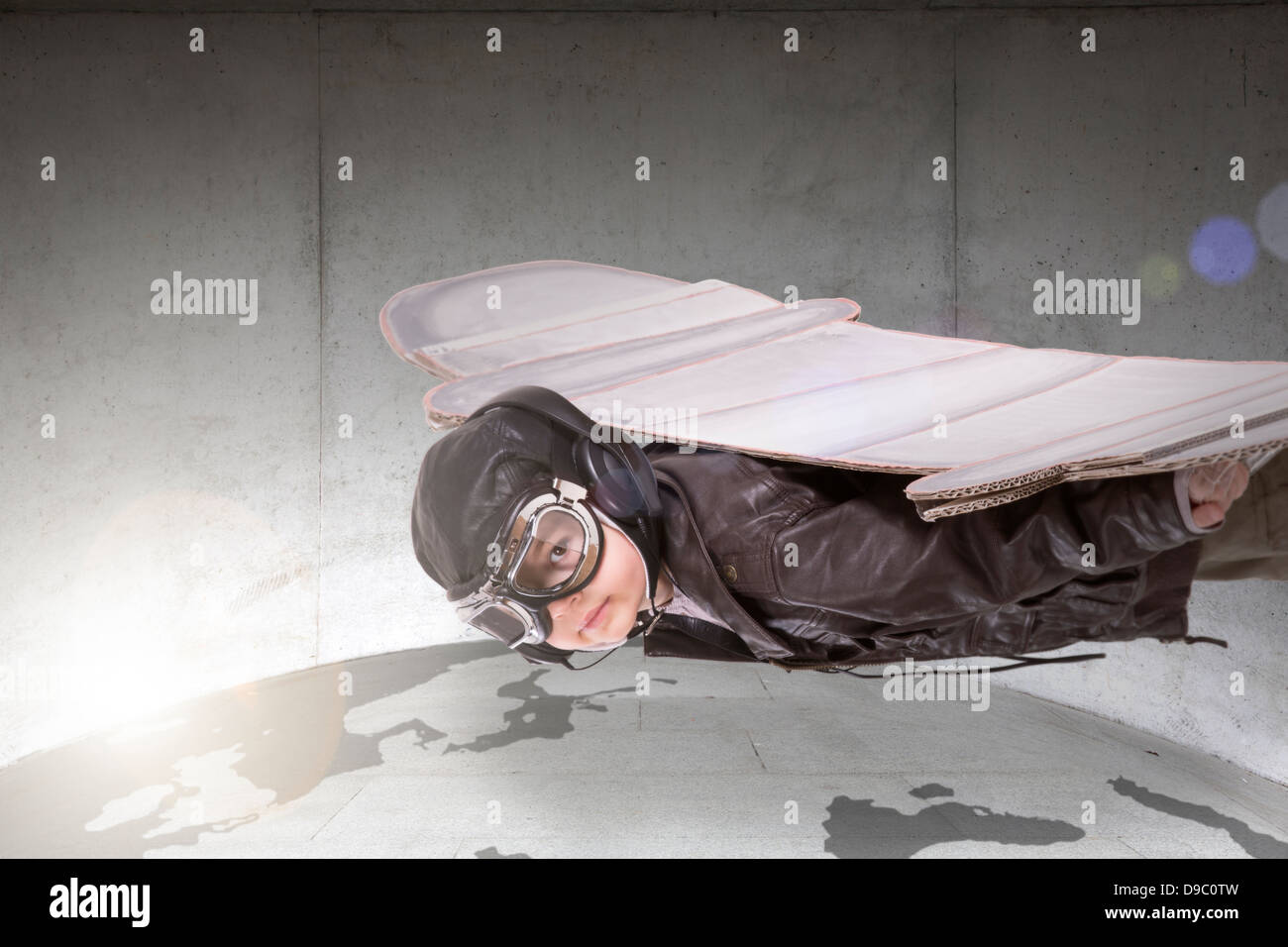 Boy flying above earth hi-res stock photography and images - Alamy
