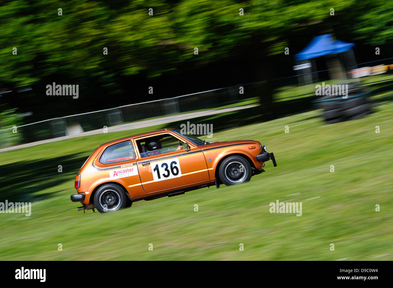 A car racing around Crystal Palace Park in London for the Motorsport at ...