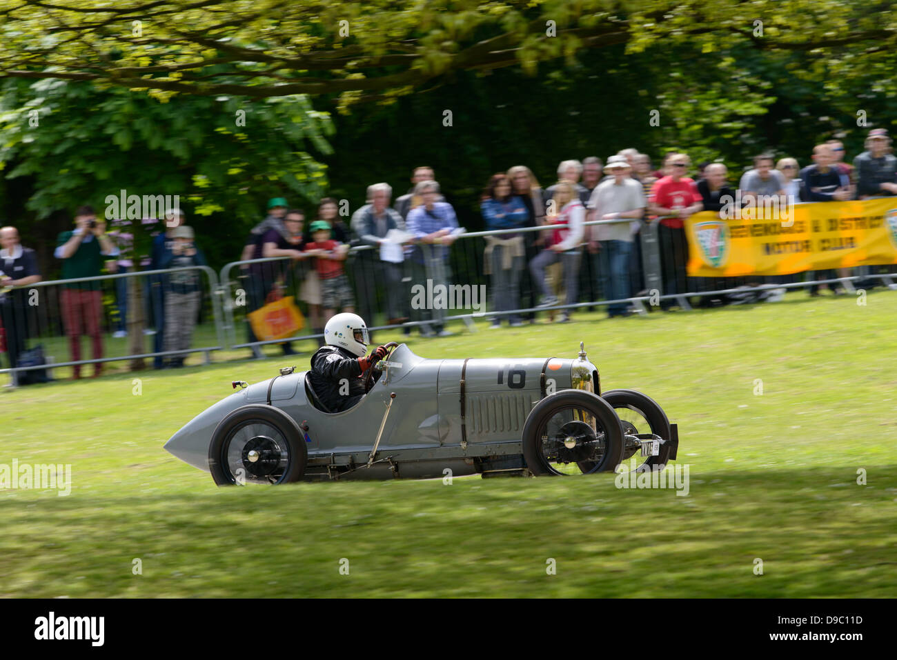 A car racing around Crystal Palace Park in London for the Motorsport at ...