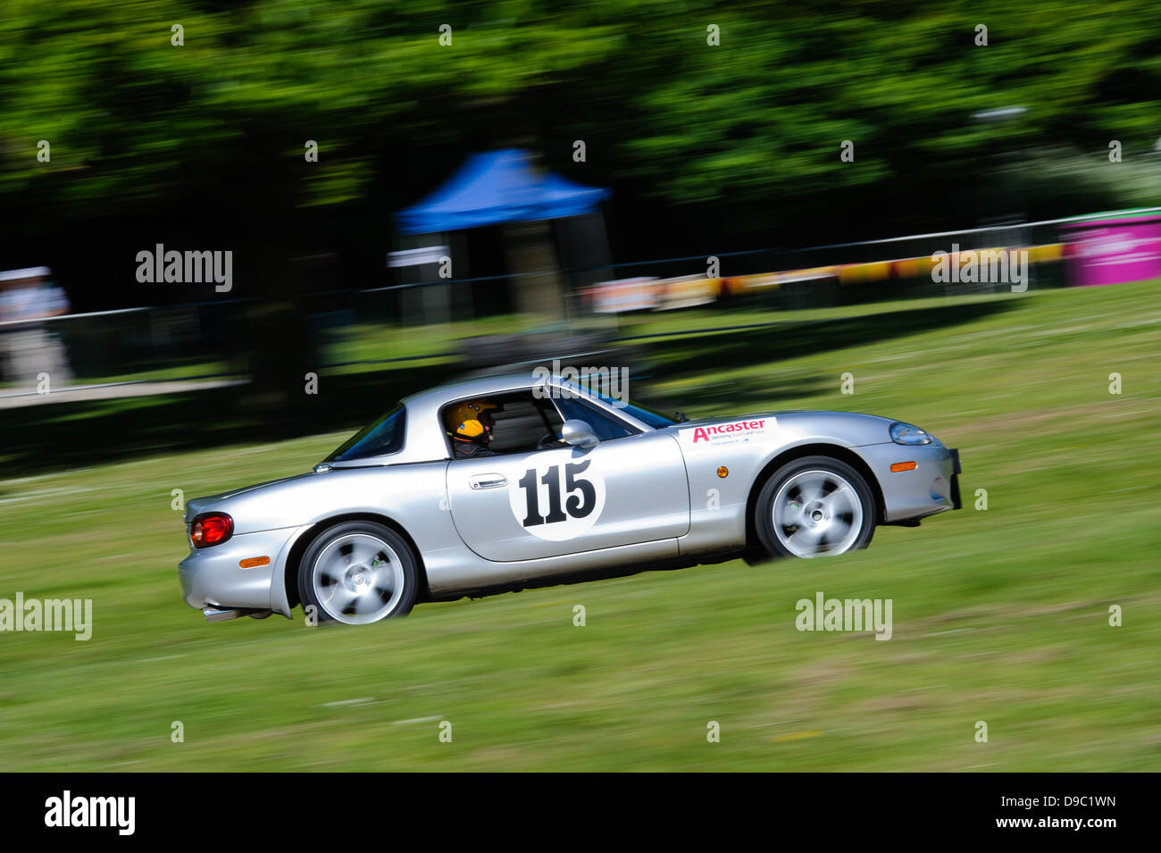A car racing around Crystal Palace Park in London for the Motorsport at ...