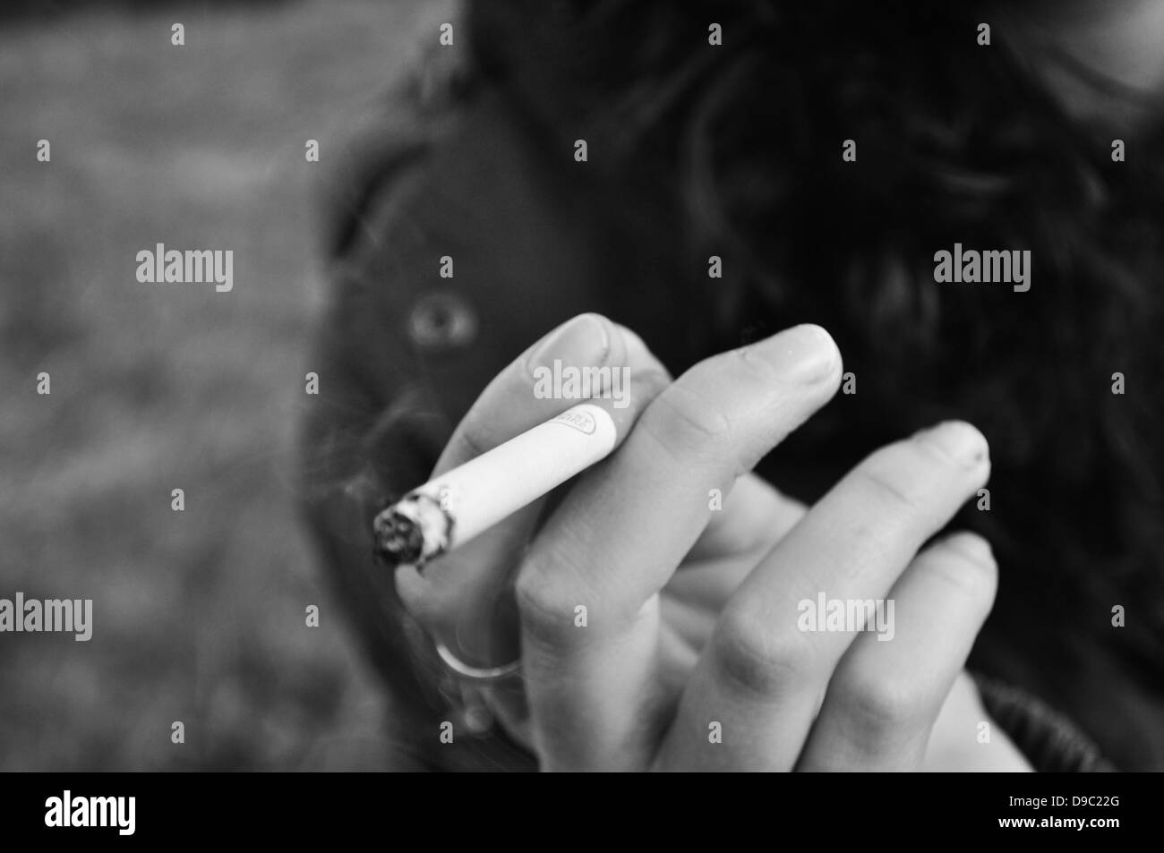 Girl Smoking In Hand Stock Photo - Alamy