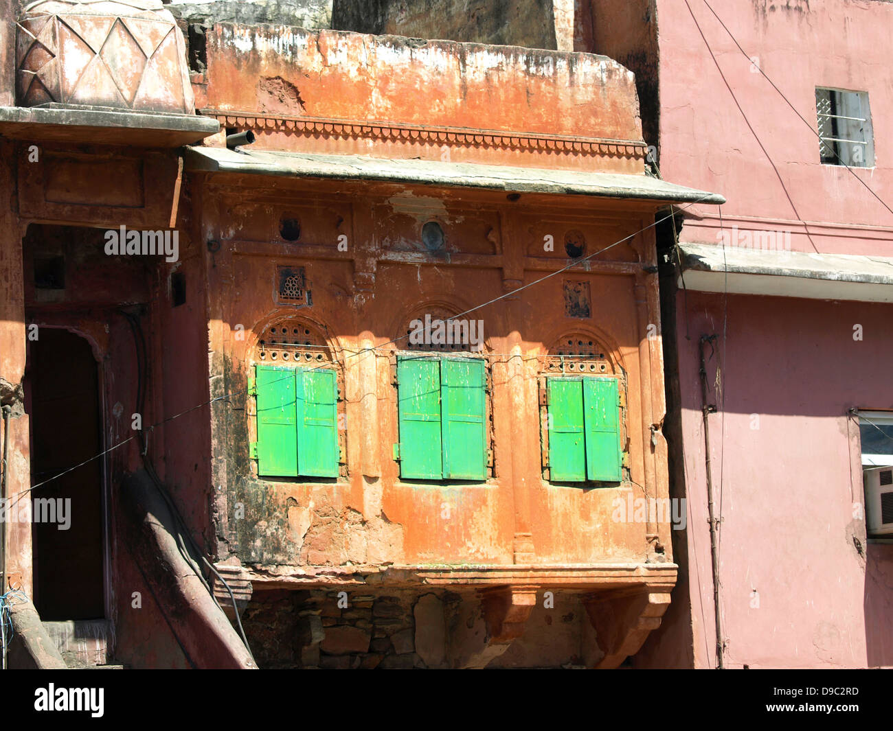 old red house with green windows in Jaipur,India Stock Photo - Alamy