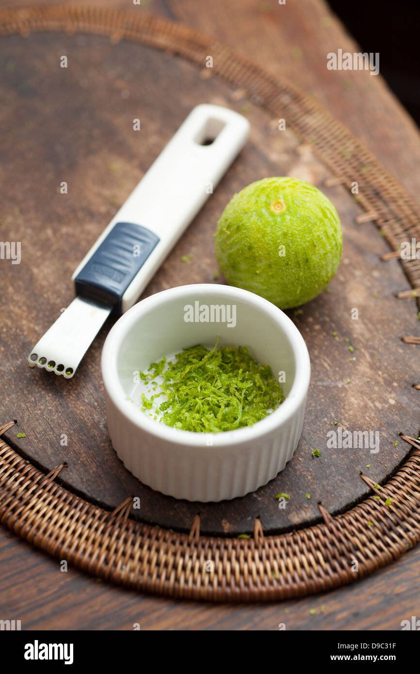 Zest Lime and zester Stock Photo - Alamy