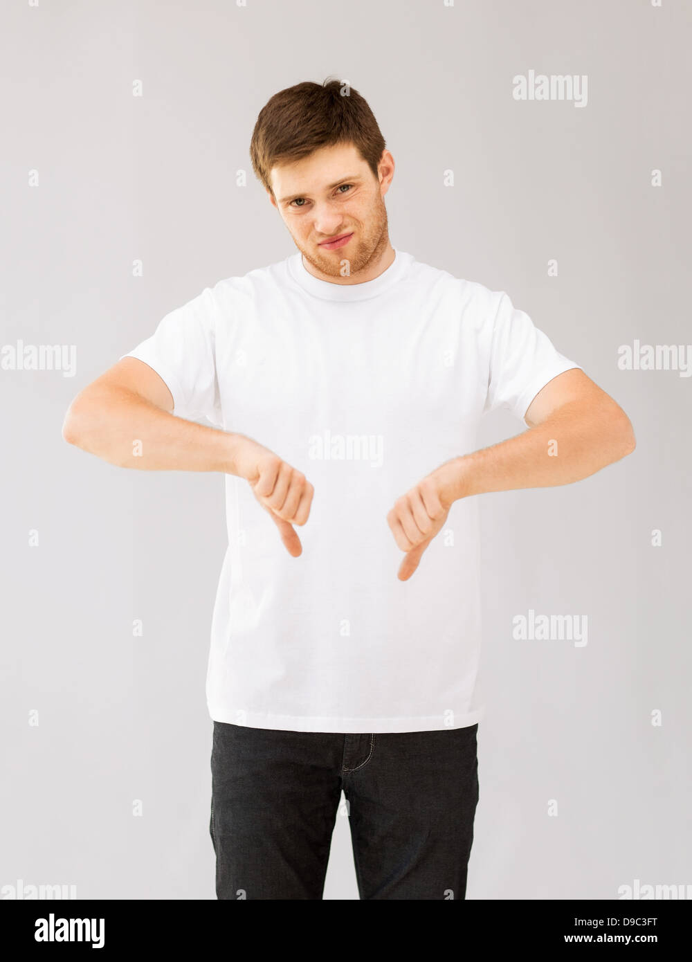 man showing thumbs down Stock Photo - Alamy