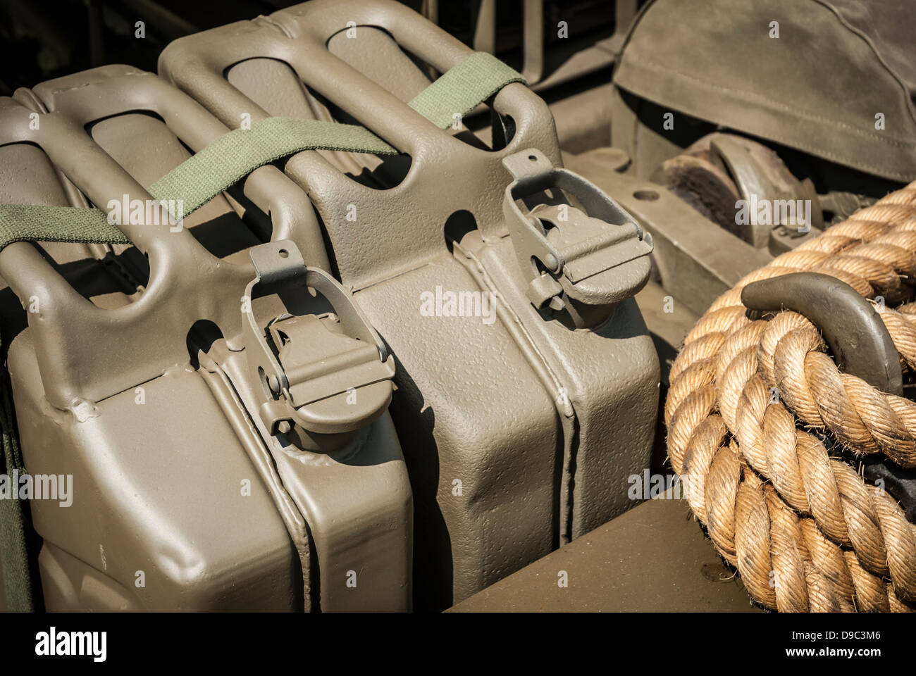 Military jerrycans strapped onto a vehicle Stock Photo - Alamy