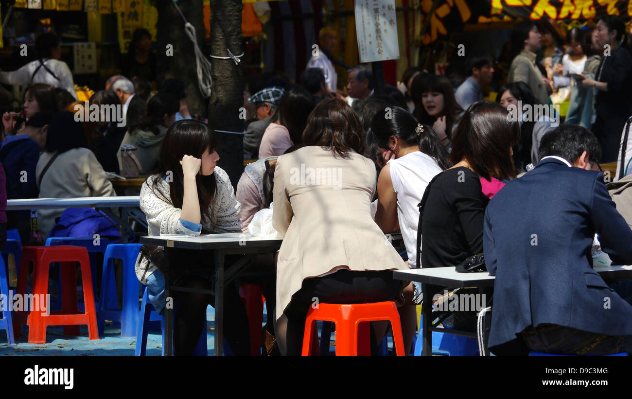 Visitors at the makeshift stalls at Yasukuni Shrine for the Cherry ...