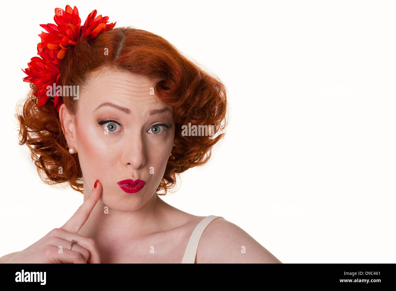 Puzzled retro woman with humorous facial expression Stock Photo - Alamy