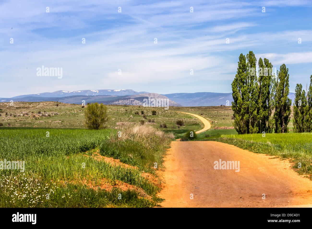 Dirt Track Country Path Leading to Hills in the distance Stock Photo ...