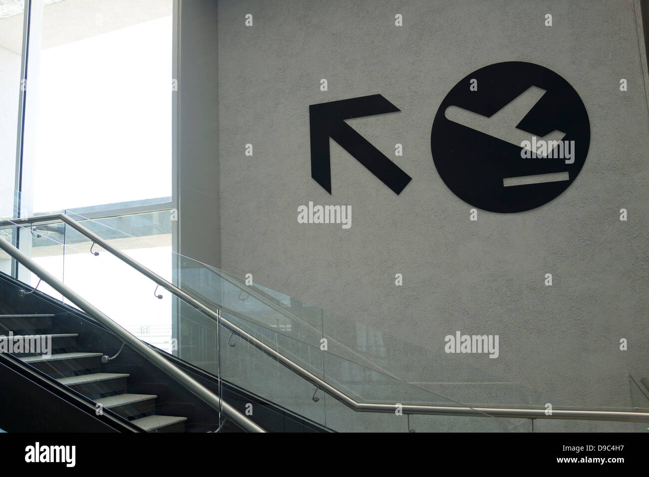 Arrow sign in airport Stock Photo - Alamy