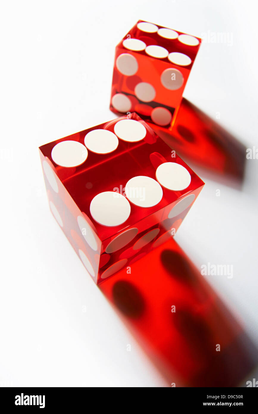 Two red dice Stock Photo - Alamy