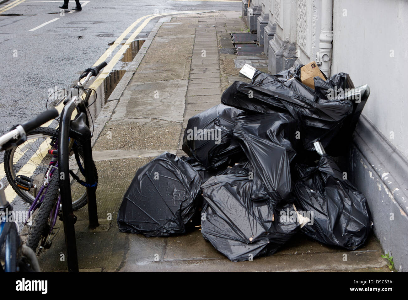 Rubbish awaiting collection blocking pavement in London's Bloomsbury ...