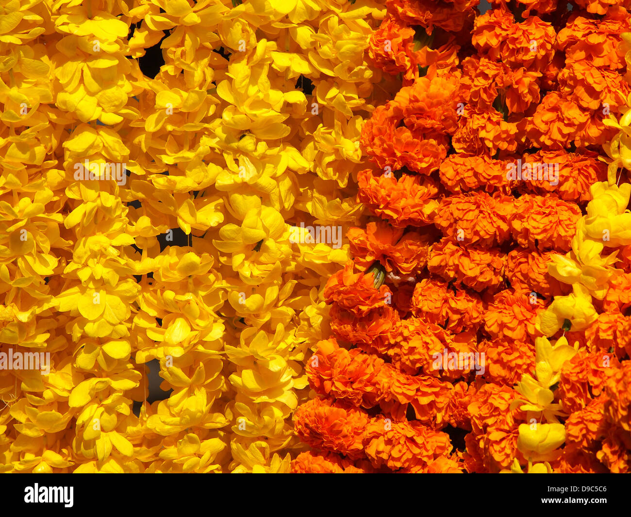 orange and yellow floral arrangement for holi festival and religious ...
